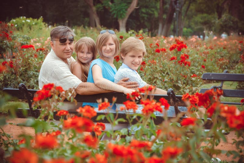 Happy family in park stock image. Image of happy, portrait - 97916181