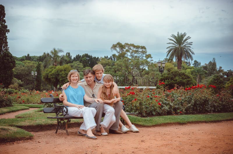 Happy family in park stock image. Image of portrait, beauty - 97916381