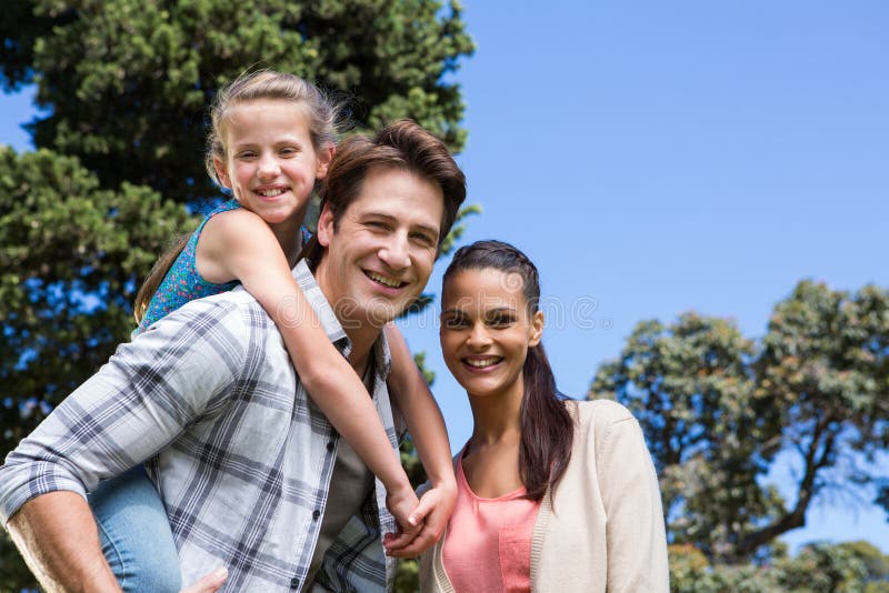 Happy Family in the Park Together Stock Image - Image of parents ...