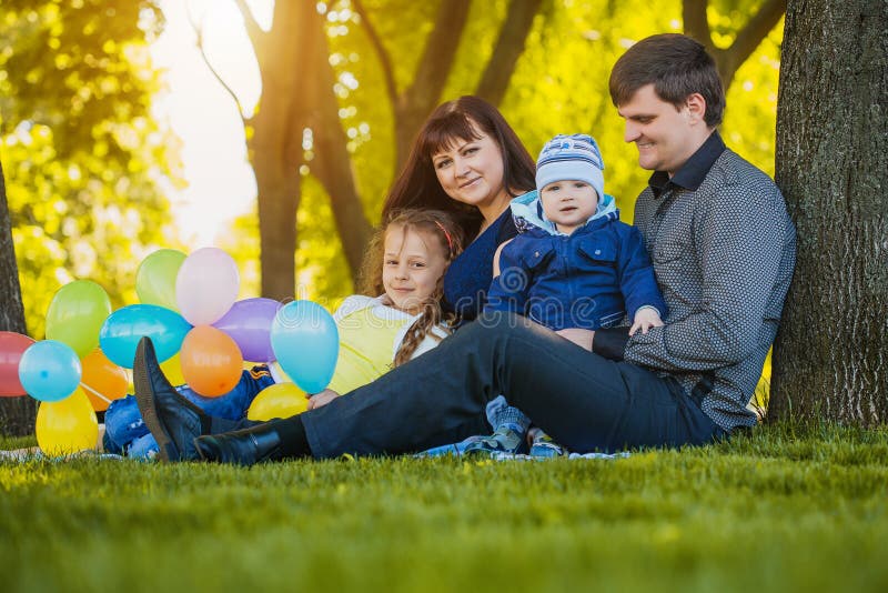 Happy Family are Plaing in the Park Stock Photo - Image of happy, child ...