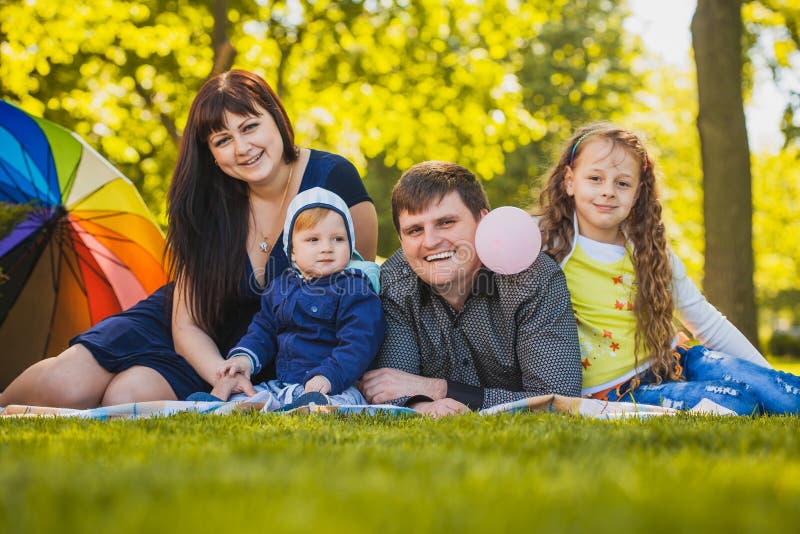 Happy Family are Plaing in the Park Stock Image - Image of couple ...
