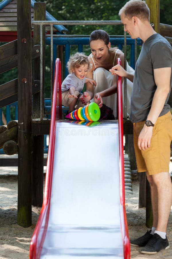 Family in Playground stock photo. Image of lifestyle - 22515212