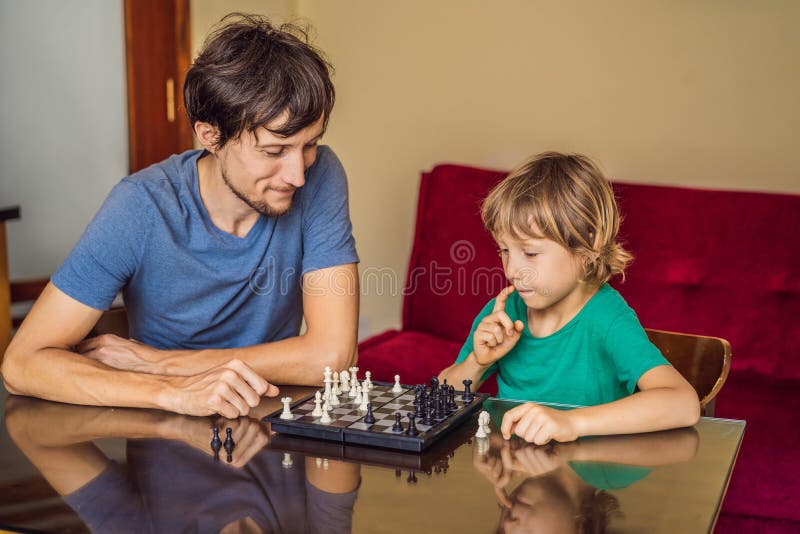 Happy Family Playing Board Game at Home Stock Photo - Image of adult ...