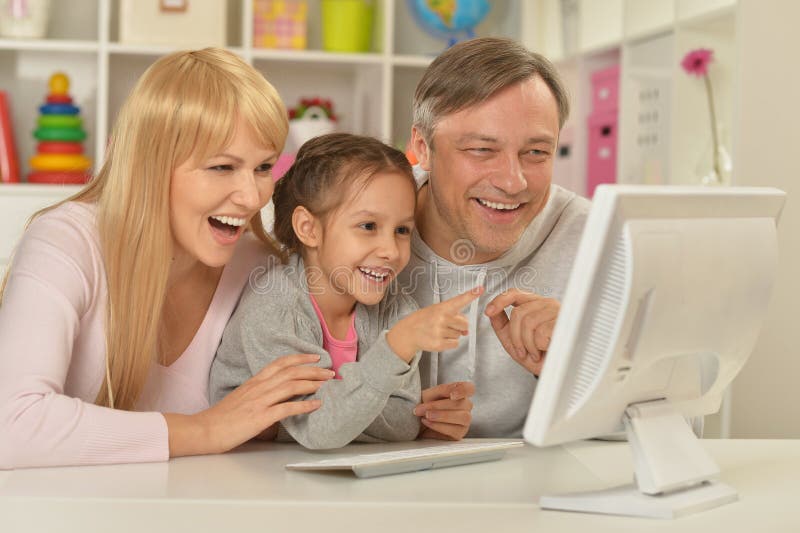 Happy Family Playing on Computer Stock Photo - Image of computer ...