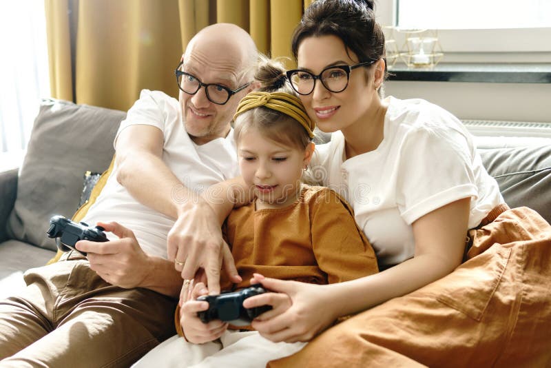 Happy Family are Playing Video Game Console at Home Stock Photo - Image ...