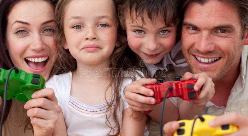 Happy Family Playing Video Games Stock Photo - Image of male, playing ...