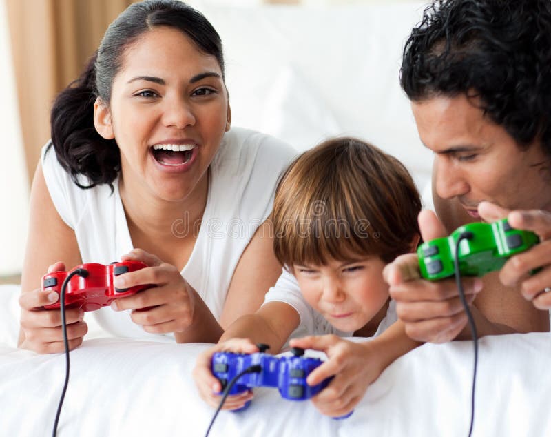 Happy Family Playing Video Games Stock Photo - Image of female, person ...