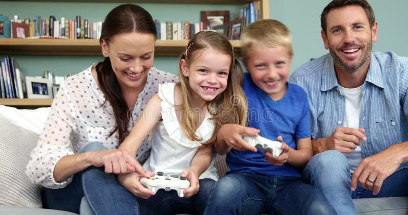 A Happy Family is Playing Video Games Stock Footage - Video of child ...