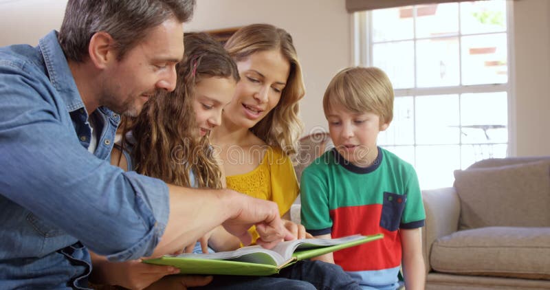 Family, Reading and Story for Learning with Children on Floor for ...