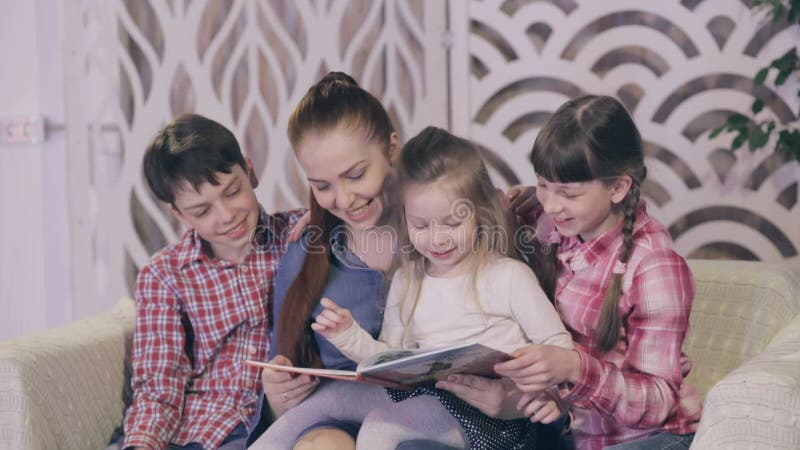 Happy Family Reading Books at Home Stock Video - Video of cheerful ...