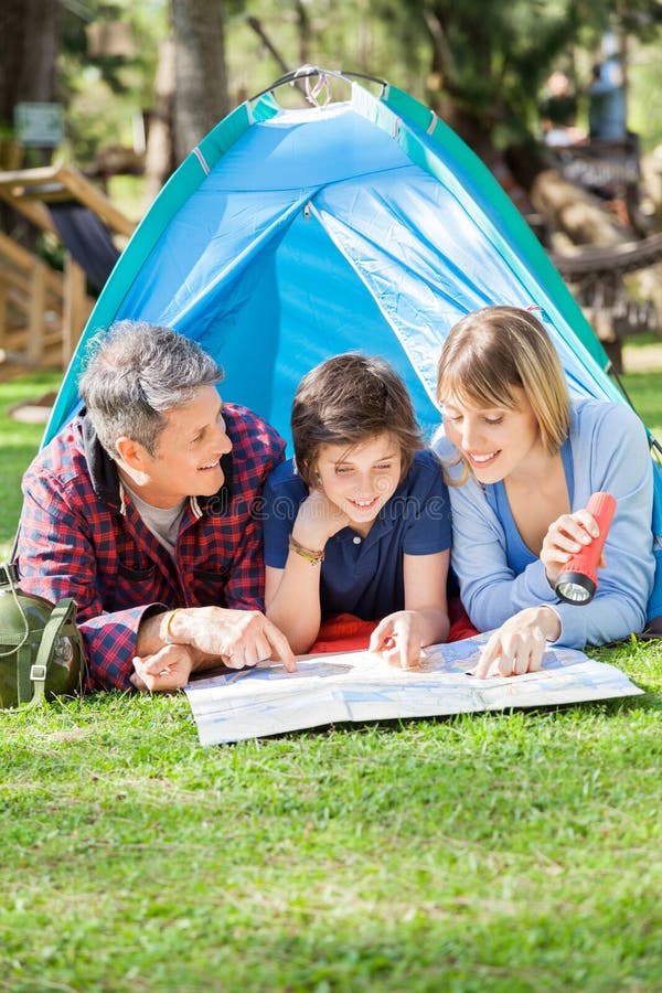 Happy Family Reading Map Tent Stock Photos - Free & Royalty-Free Stock ...