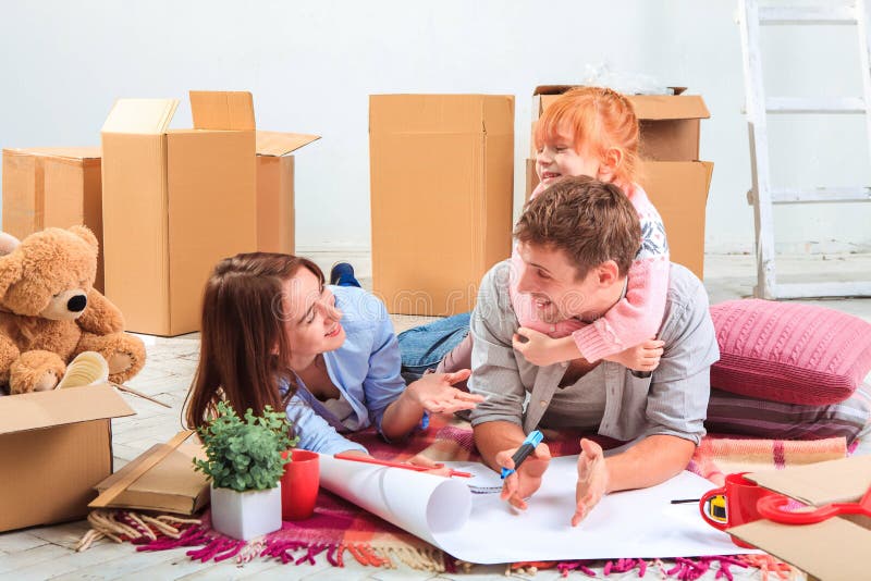 The Happy Family during Repair and Relocation Stock Photo - Image of ...