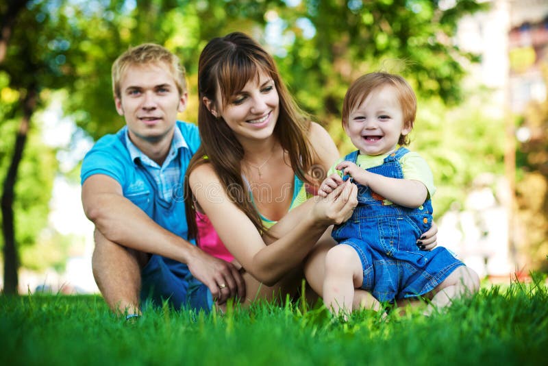 Happy Family are Resting in the Green Summer Park Stock Image - Image ...