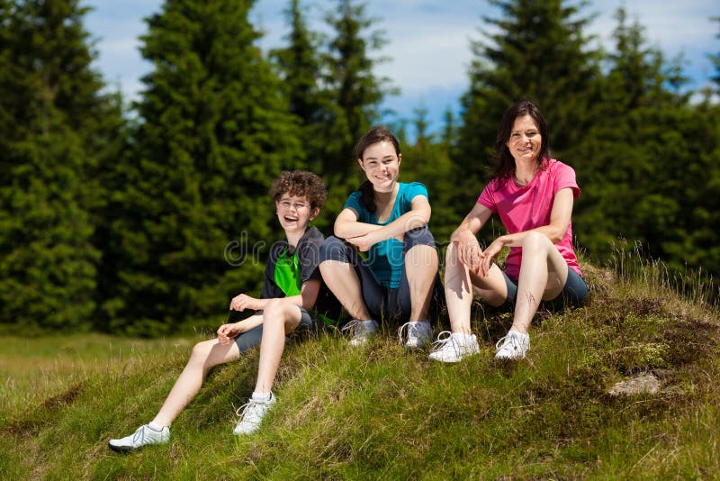 Happy Family Resting Outdoor Stock Image - Image of resting, sitting ...