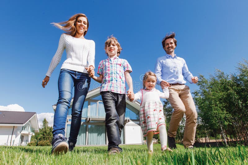 Happy family running stock photo. Image of home, husband - 275936168
