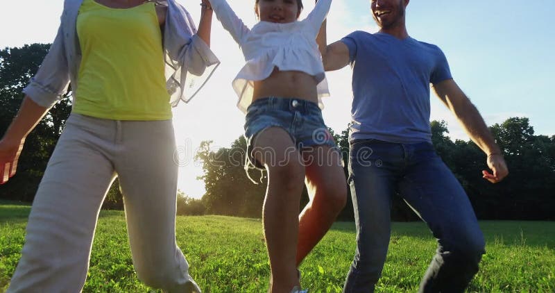 Happy Family Running Together Stock Video - Video of leisure, female ...