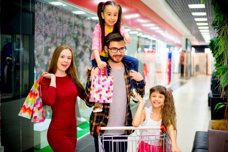 Happy family shopping stock photo. Image of mall, retail - 94024220
