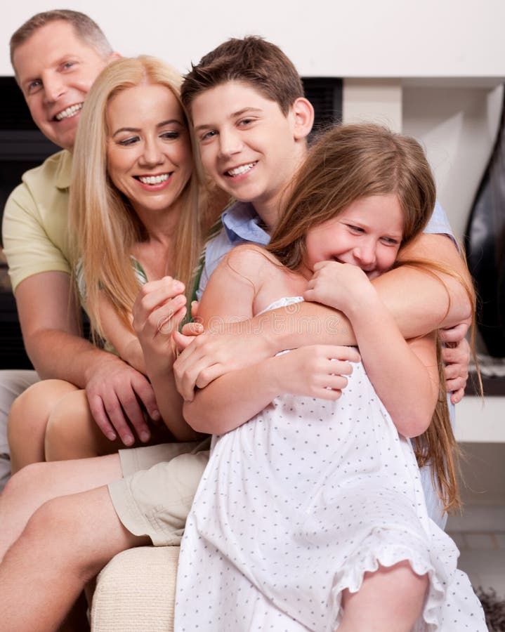 Happy Family Sitting in Straight and Having Fun Stock Image - Image of ...