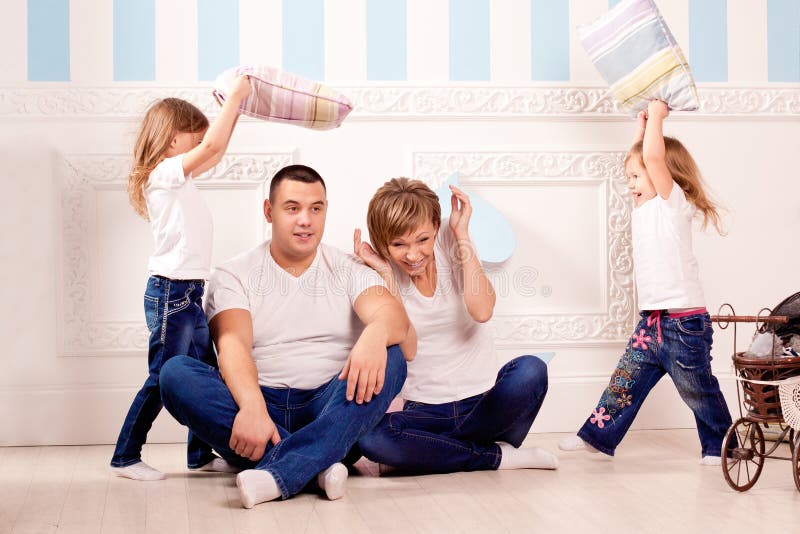 Happy Family Smiling at Home Stock Image - Image of affectionate ...