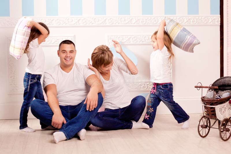 Happy Family Smiling at Home Stock Photo - Image of happy, child: 43395476