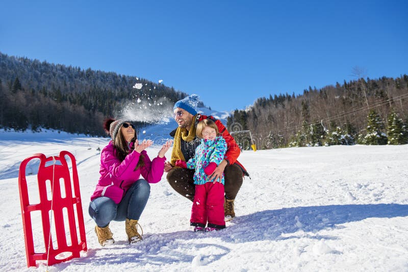 Happy Family in Snow Riding on Sledge. Stock Photo - Image of friendly ...
