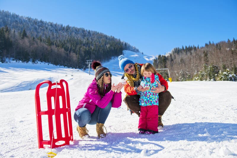Happy Family in Snow Riding on Sledge. Stock Image - Image of company ...