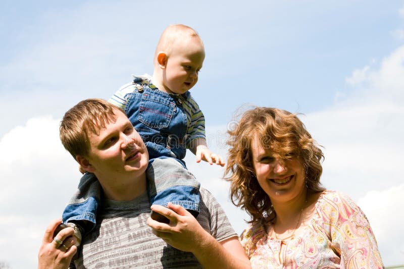 Happy family with son stock photo. Image of nature, meadow - 13512914
