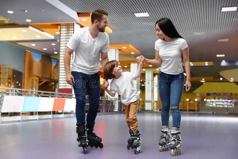 Happy Family Time at Roller Skating Rink Stock Photo - Image of people ...