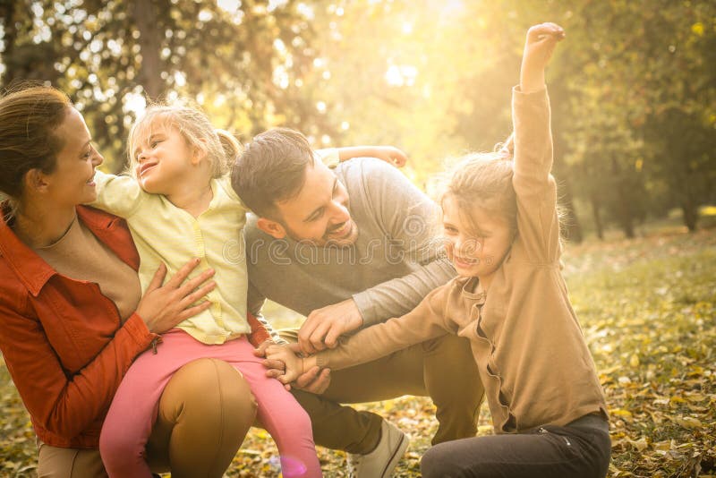 Happy Family Spending Time Together Outdoors. Stock Image - Image of ... Happy Family Spending Time Together Outdoors. Stock Image - Image of ...