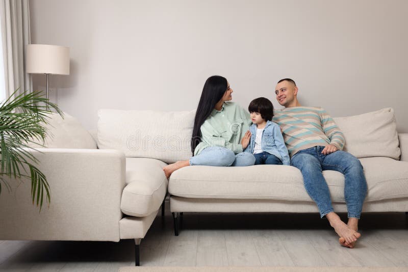 Happy Family Spending Time Together on Sofa at Home Stock Image - Image ...