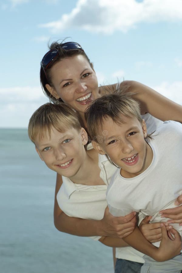 Happy family in the summer stock photo. Image of adult - 98072044