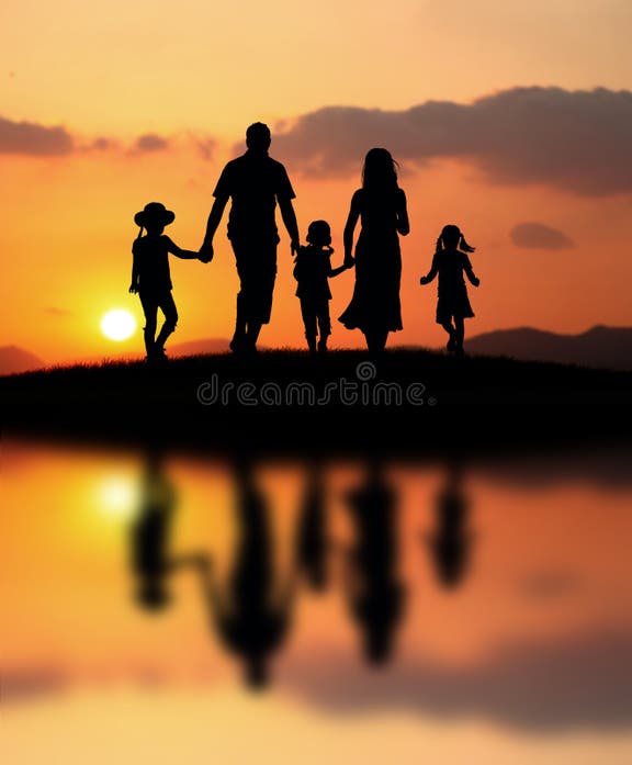 Happy family at sunset stock image. Image of glowworm - 25278429