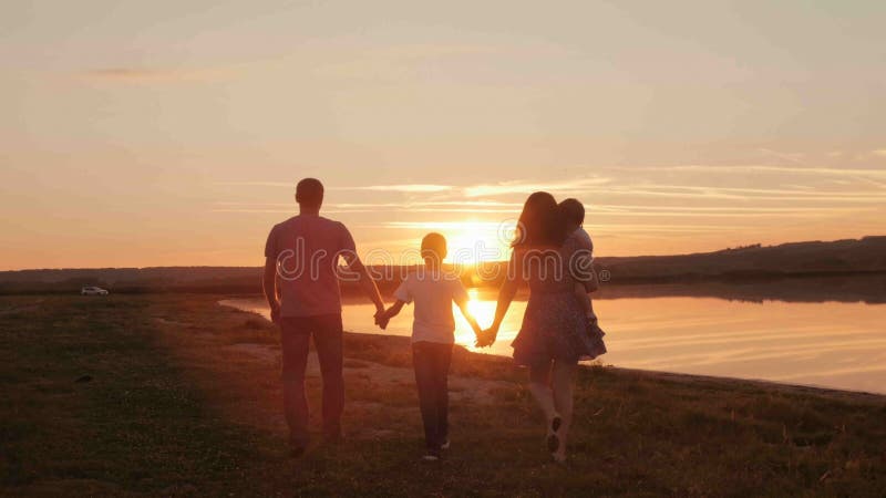 Happy Family on Sunset Silhouette Stock Photo - Image of lifestyle ...