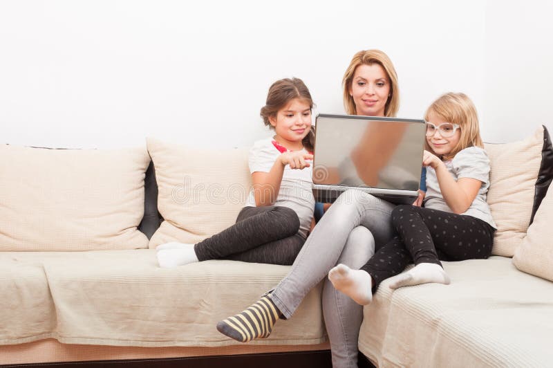 Happy Family Surfing or Browsing Internet Together Stock Photo - Image ...