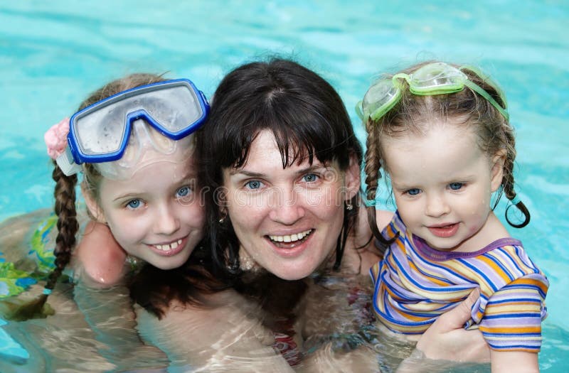 Happy Family in Swimming Pool. Stock Image - Image of goggles, people ...