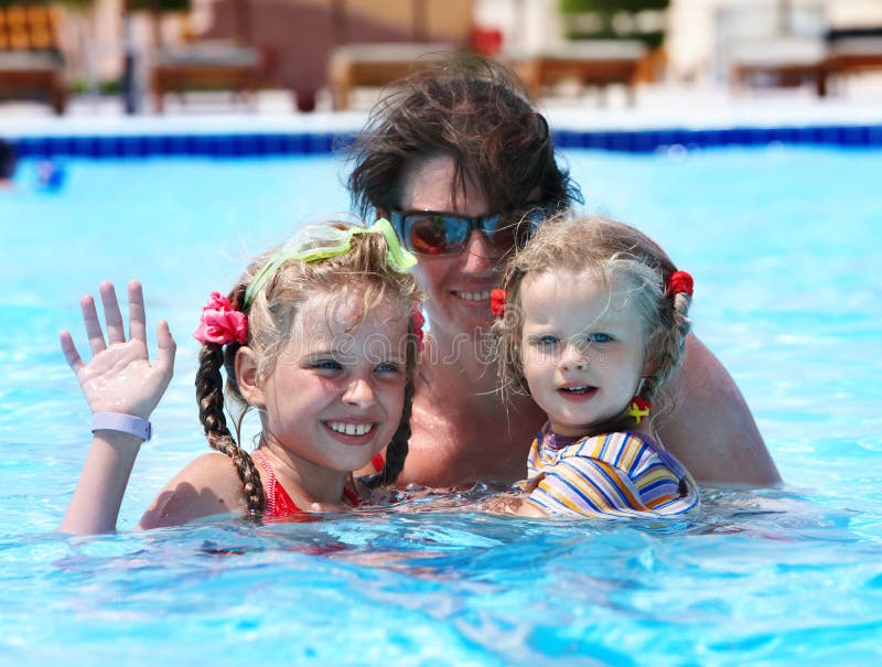Happy Family in Swimming Pool. Stock Photo - Image of activity, love ...