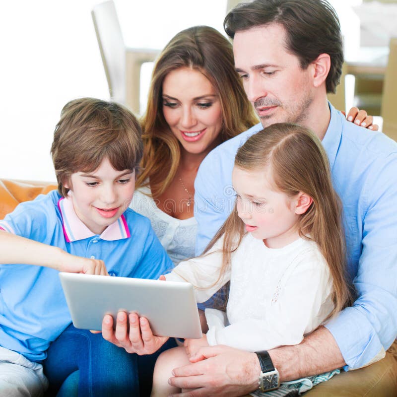 Happy Family with Tablet Pc Stock Photo - Image of smiling, cheerful ...