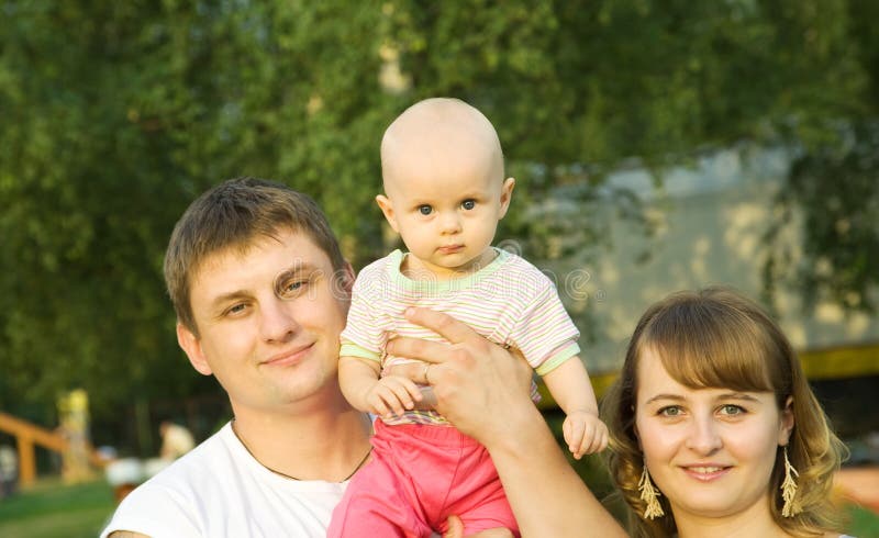 Happy family of three stock photo. Image of three, summer - 15837922