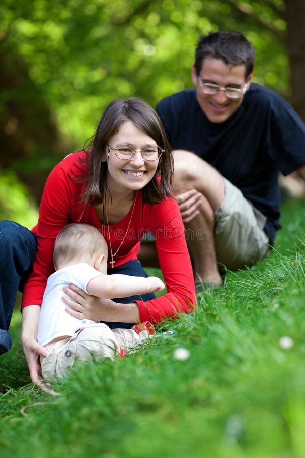 Happy family of three stock image. Image of couple, laugh - 22069115