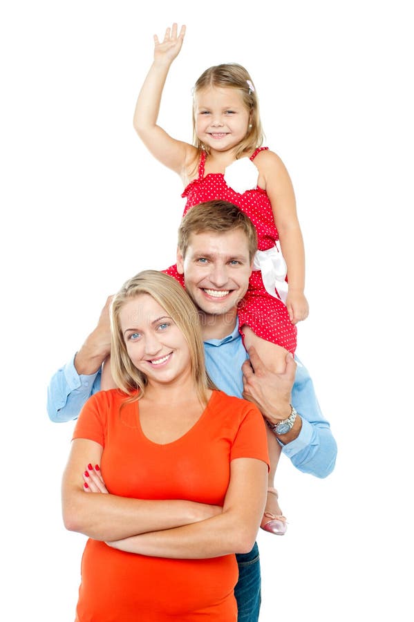 Happy Family of Three Members Standing in Embrace Stock Photo - Image ...