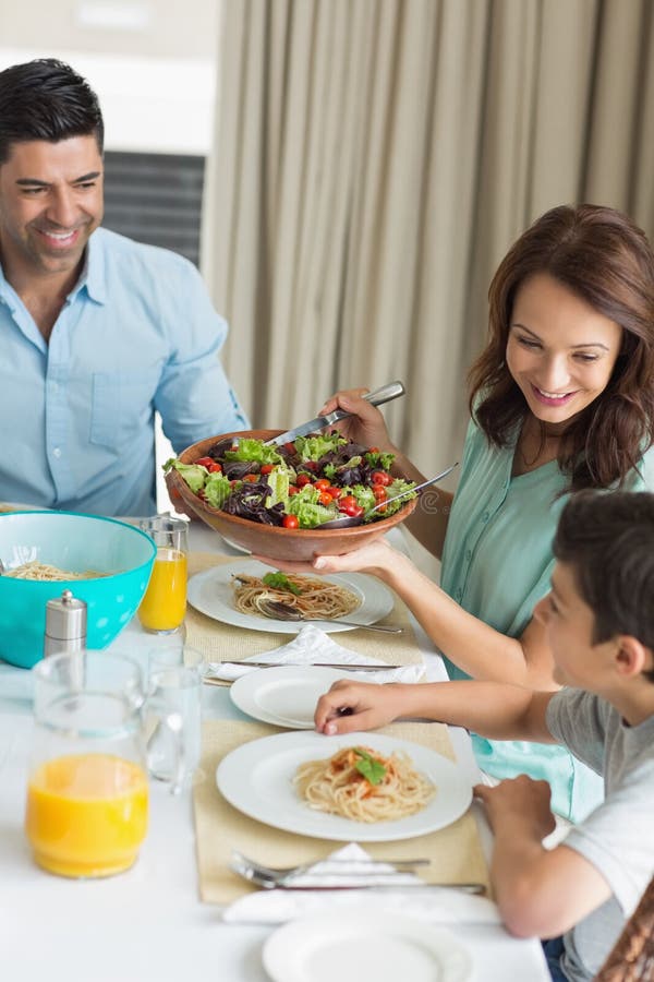 Portrait Happy Family Four Sitting Dining Table Stock Photos - Free ...