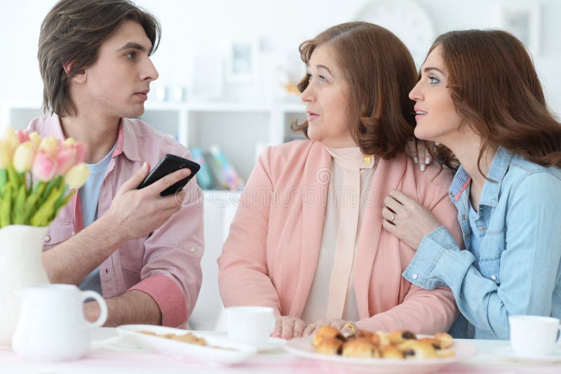 Happy Family of Three Spending Time Together at Dinner Stock Image ...