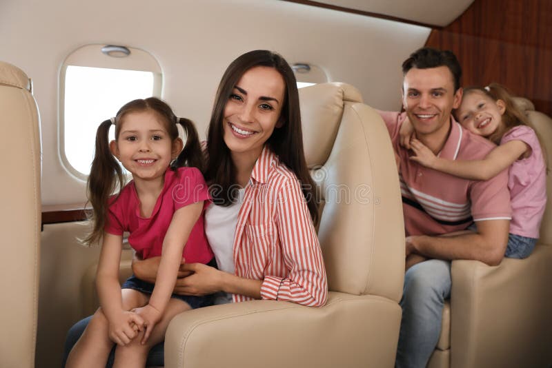 Happy Family Together in Airplane during Flight Stock Photo - Image of ...