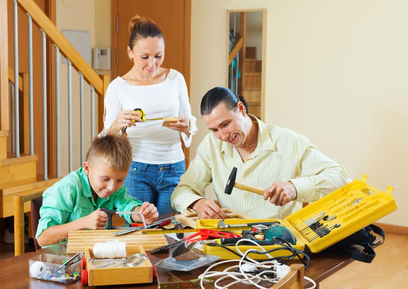 Happy Family Three Doing Something Tools Stock Photos - Free & Royalty ...