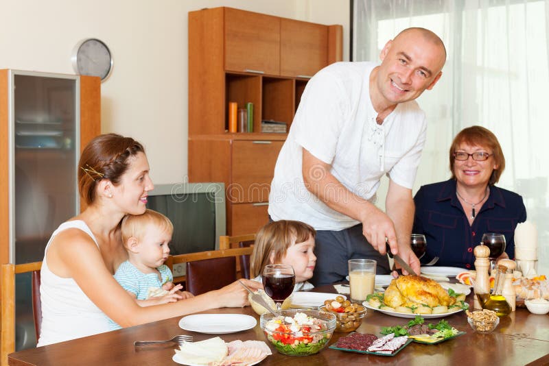 Happy Family Together Over Dining Table Stock Image - Image of group ...