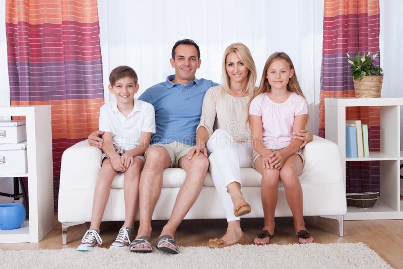 A Happy Family with Two Children Stock Image - Image of living ...