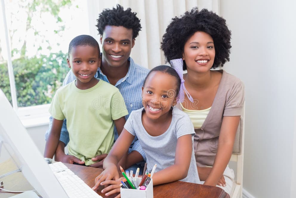 Happy Family Using the Computer Stock Photo - Image of domicile ...