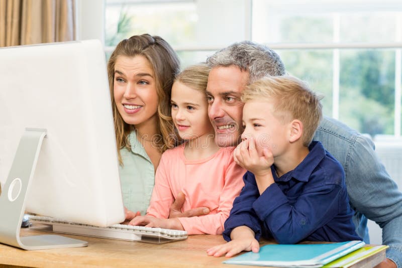 Family Using a Laptop in Bed Stock Image - Image of bedroom, person ...