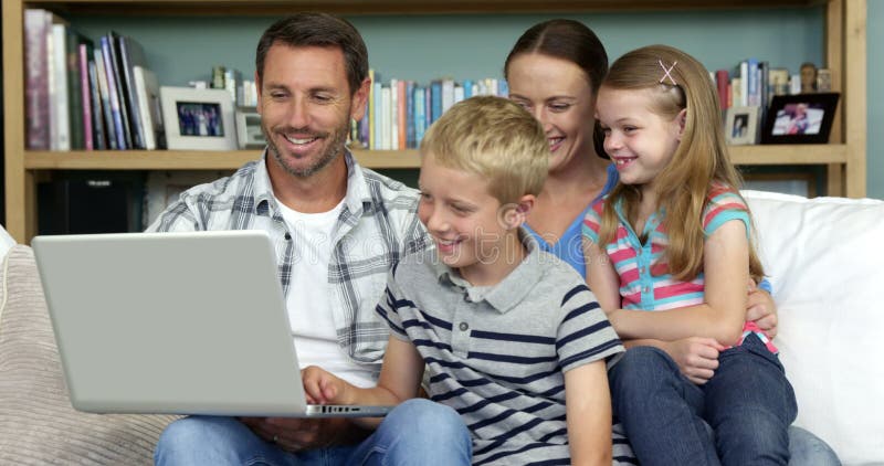 A Happy Family is Using a Computer Stock Footage - Video of happy ...
