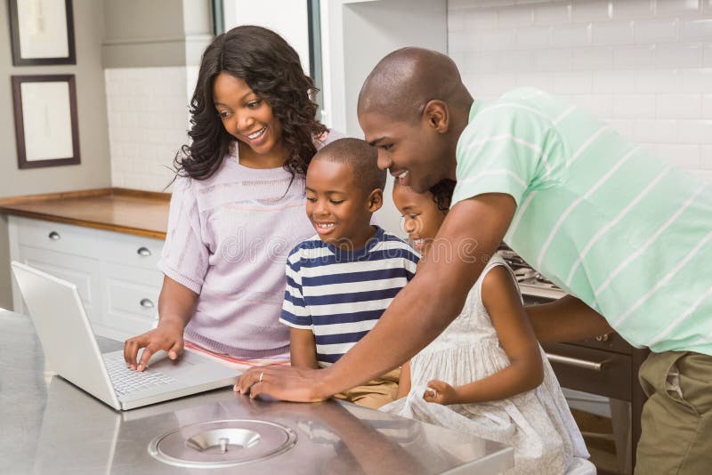 Happy family using laptop stock image. Image of love - 62321743